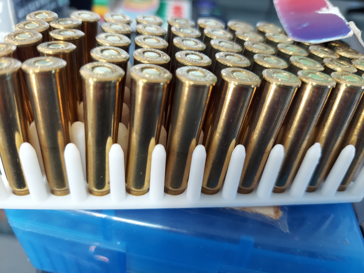 This is two boxes of ammo one blue box 7-62Komaha 29 rounds the other ...