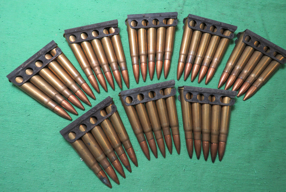 Unknown Military 303 British MK 7 Ball ammo, 40 rounds on stripper ...