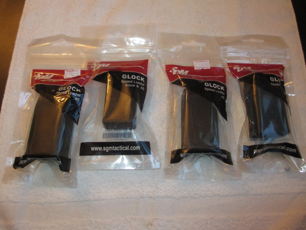 LOT of 4 SPEED LOADERS FOR GLOCK PISTOL MAGAZINES 17177990 - GunAuction.com