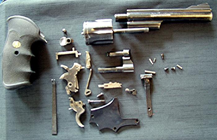 Two Bags Of S&W Revolver Parts And Other Parts. For Sale at GunAuction ...