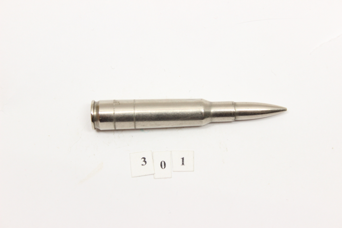 Single Shell 7mm Mauser All Nickel Maybe some kind of parade route ...