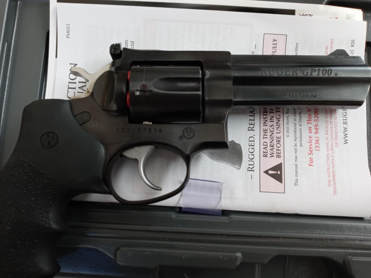 Ruger GP100 double-action revolver, blued, nice beefy rubber grip, like ...