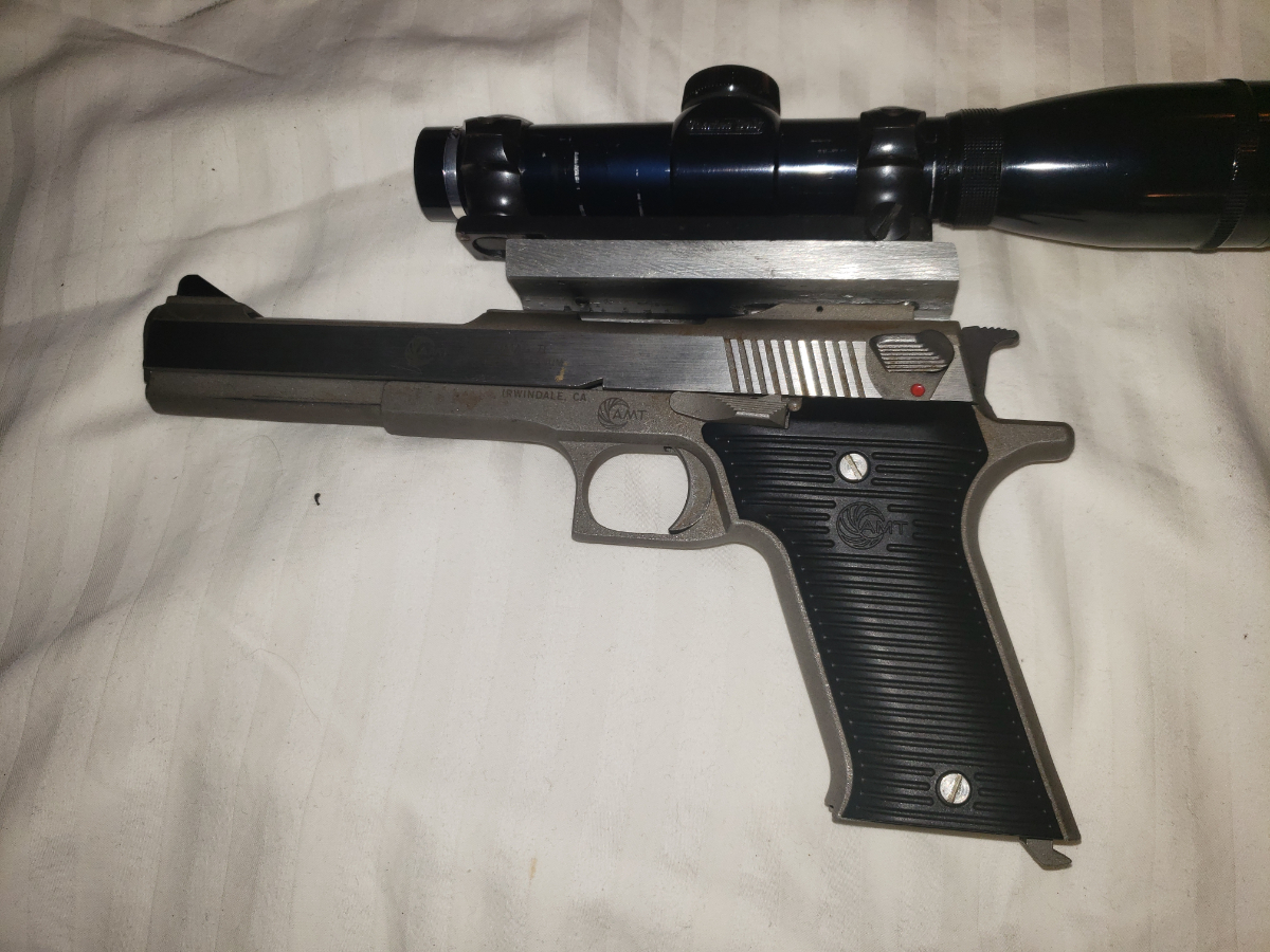 AMT Stailess steel, auto mag II , with scope and factory box. I made ...